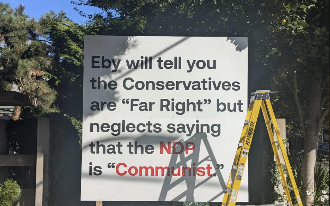 Chip Wilson’s “BC NDP Communists” Sign Defaced with Graffiti